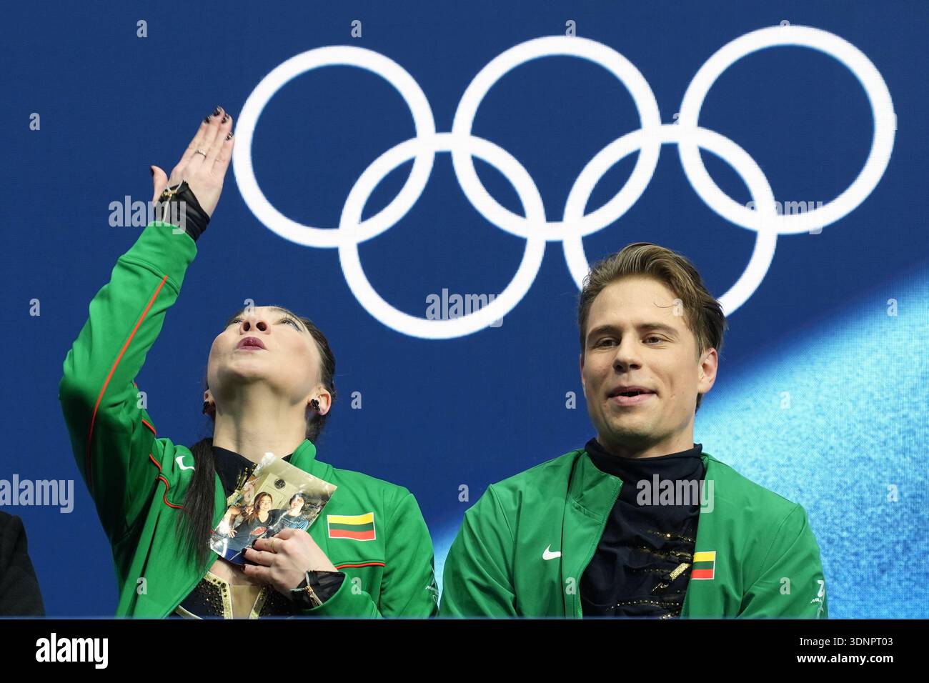 Allison Reed and Saulius Ambrulevicius of Lithuania react after ...
