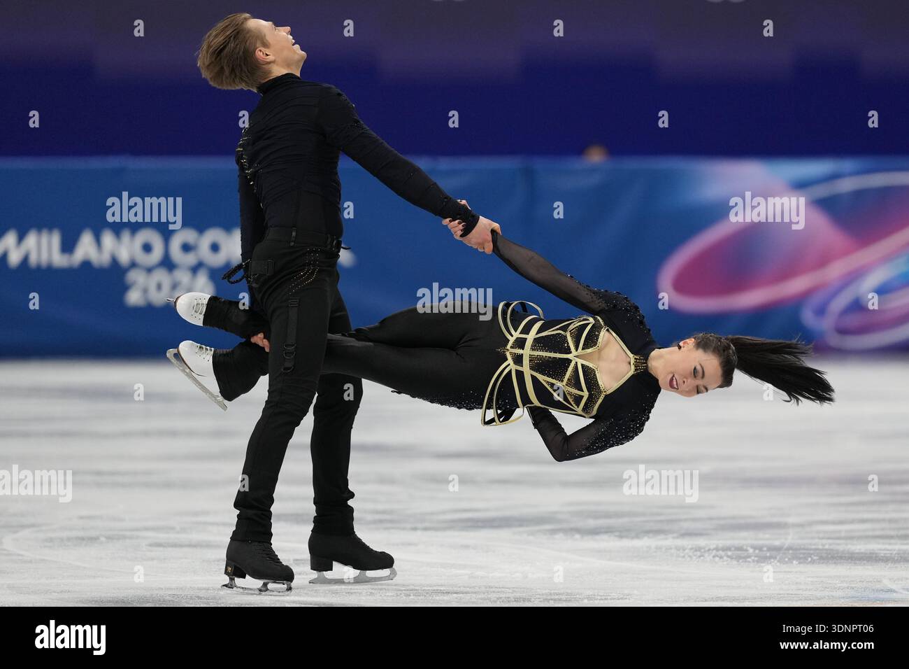 Allison Reed and Saulius Ambrulevicius of Lithuania compete during the ...