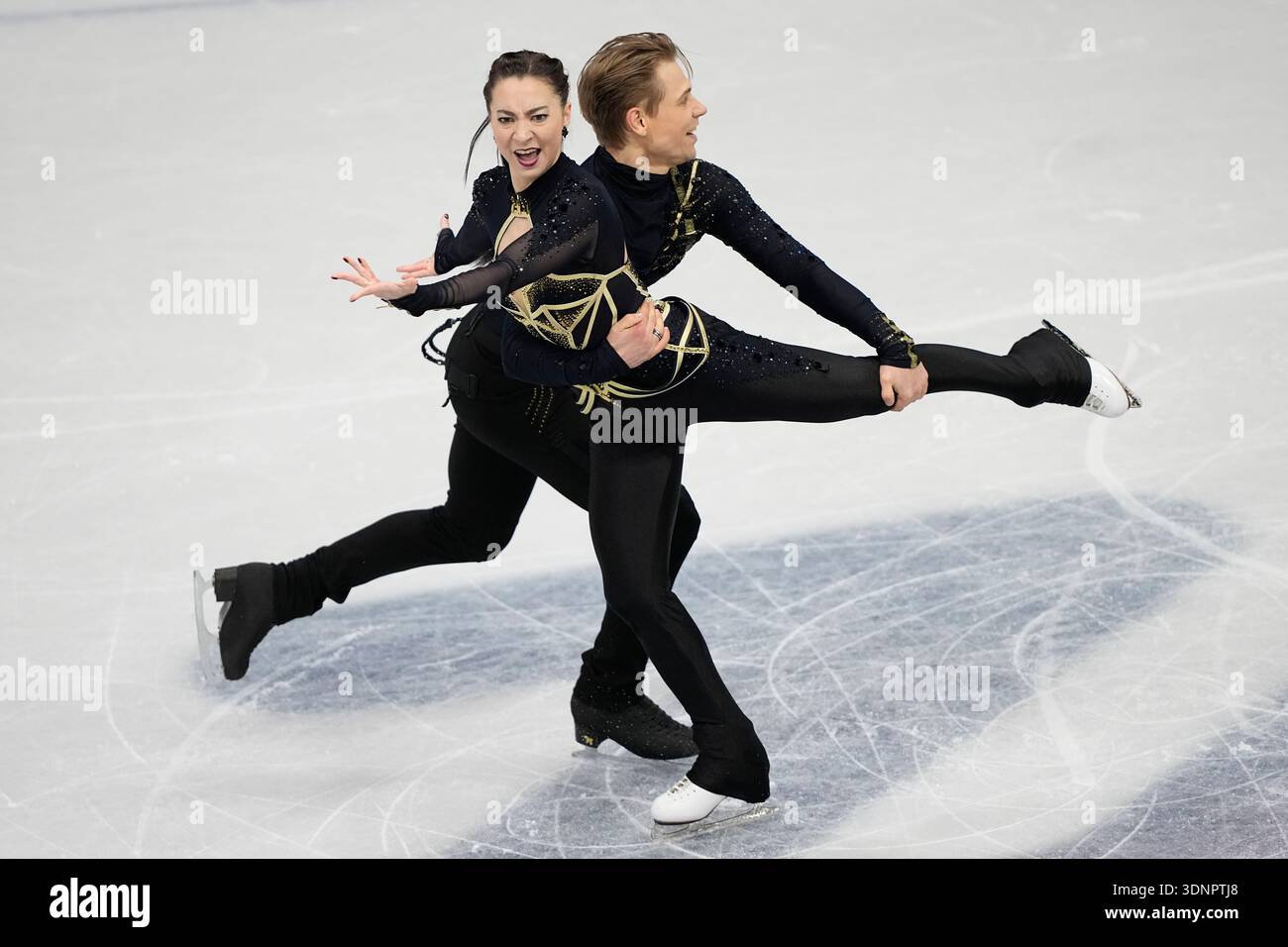 Allison Reed and Saulius Ambrulevicius of Lithuania compete during the ...