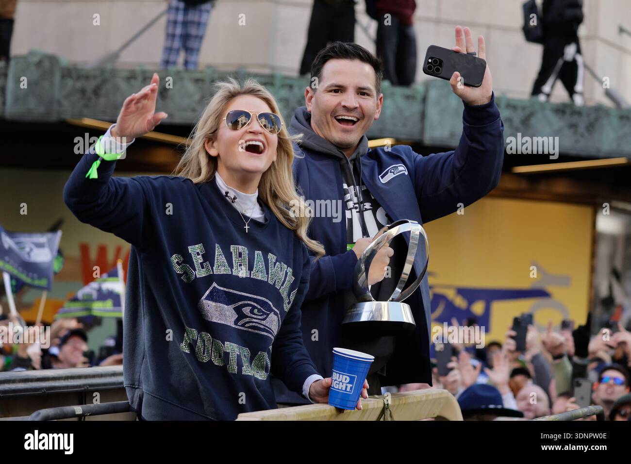 Seattle Seahawks head coach Mike MacDonald waves to the crowd during ...