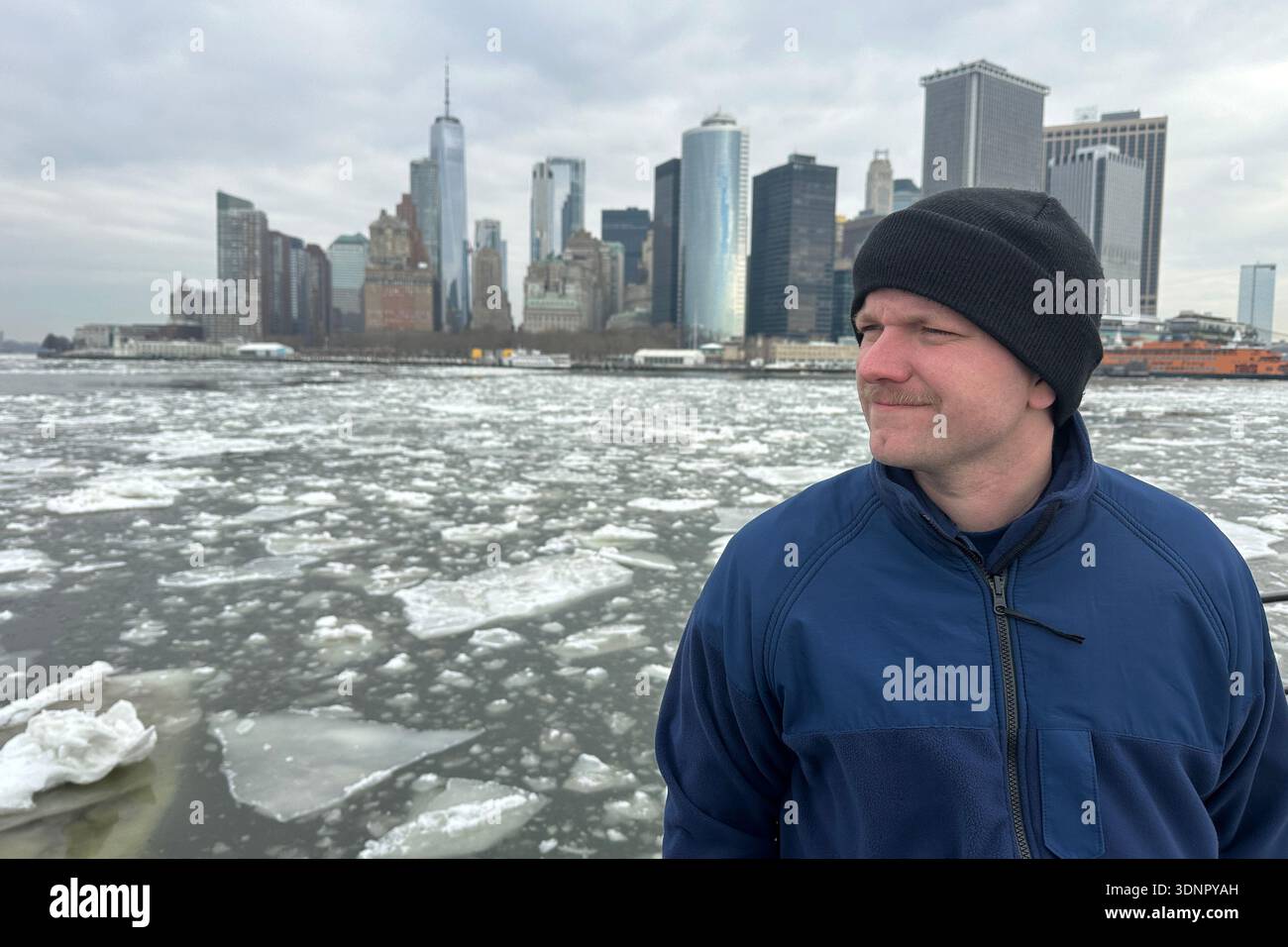 Coast Guard Seaman Frederick Steinberg monitors ice breaking from the ...