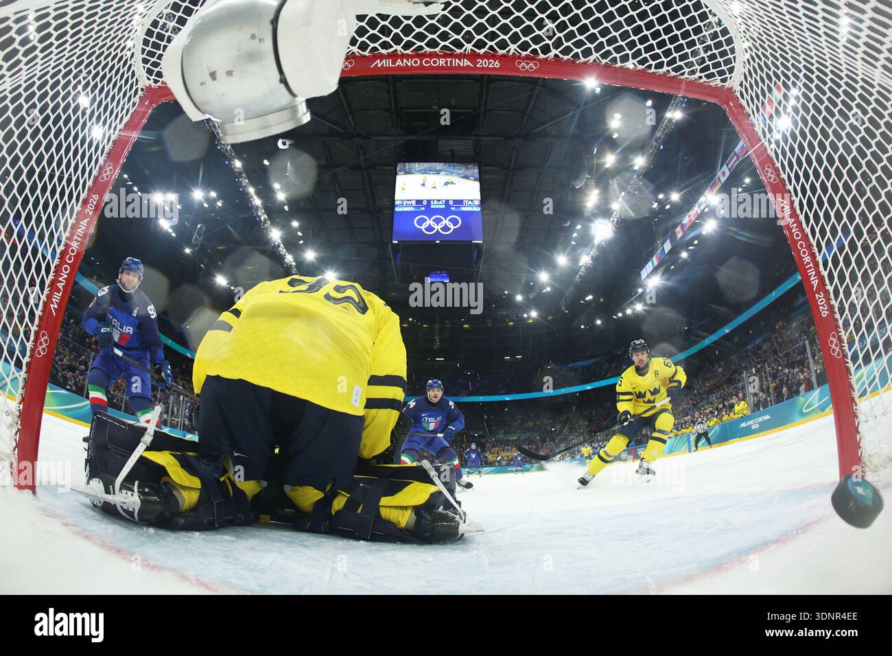 Italy's Luca Frigo, left, scores his side's opening goal during a ...