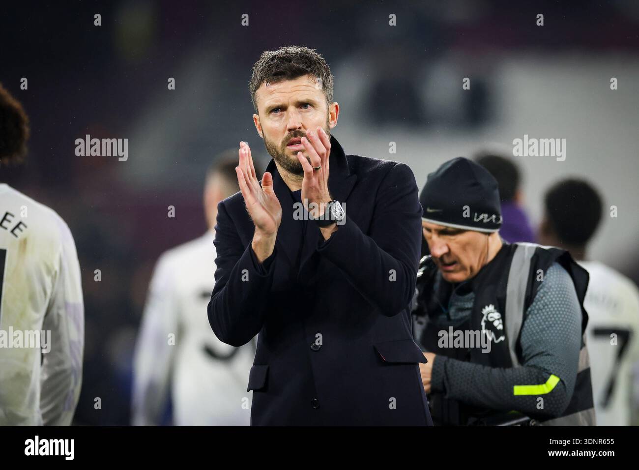 Manchester United head coach Michael Carrick applauds the fans after ...