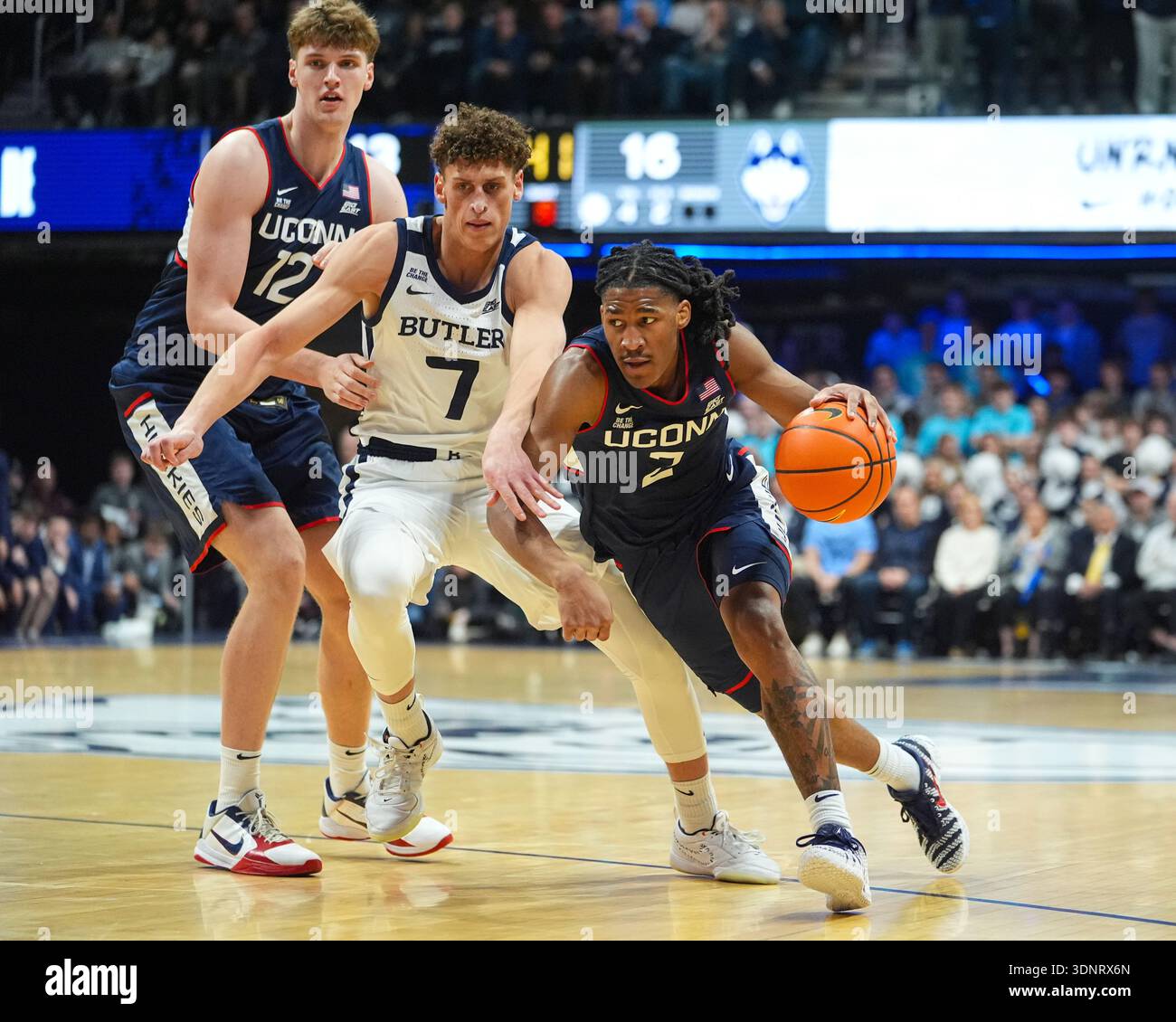 UConn guard Malachi Smith (0) drives past Butler guard Jamie Kaiser Jr ...