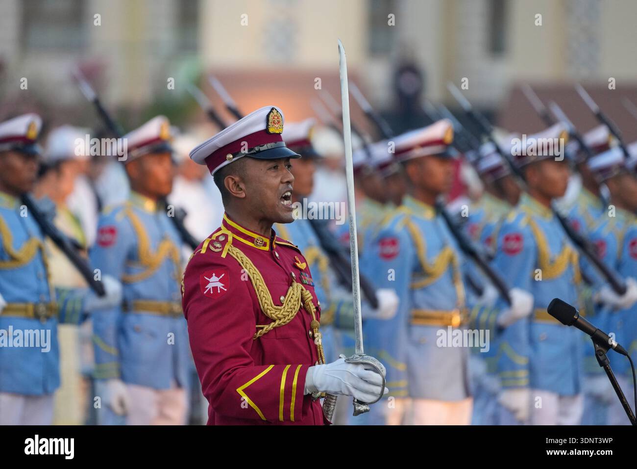 A commander of an honor guard shouts during a ceremony to mark Myanmar ...