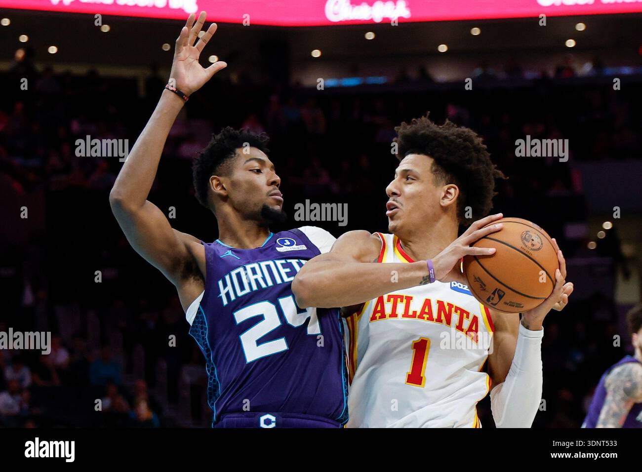 Atlanta Hawks forward Jalen Johnson (1) drives into Charlotte Hornets ...