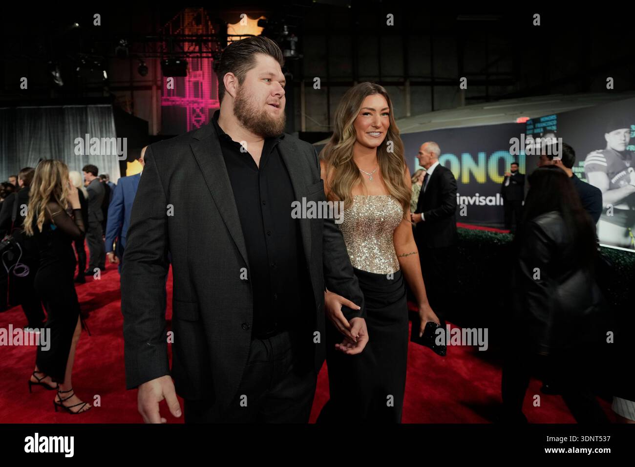 Kansas City Chiefs' Creed Humphrey, left, and Ana Demmer arrive before ...