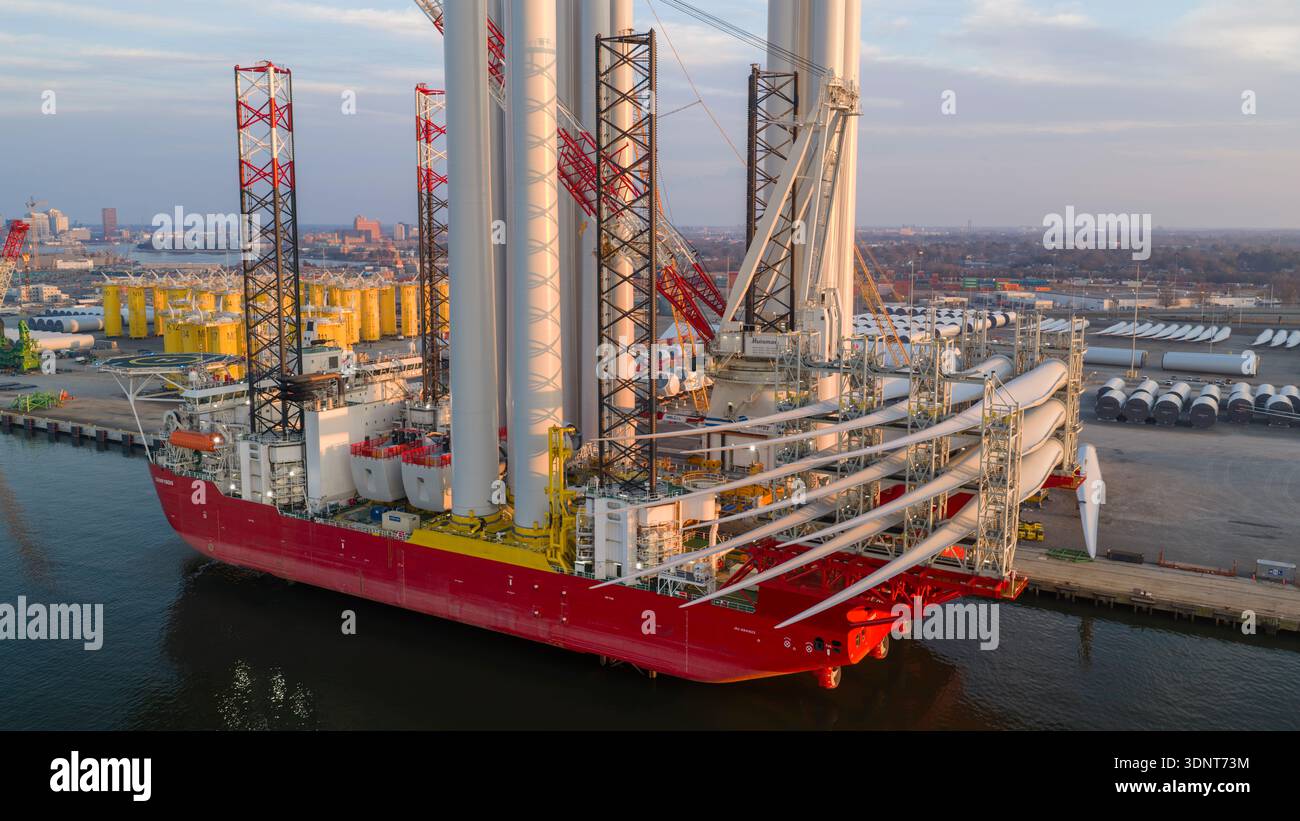 A construction barge is loaded pier side at the Dominion Energy ...