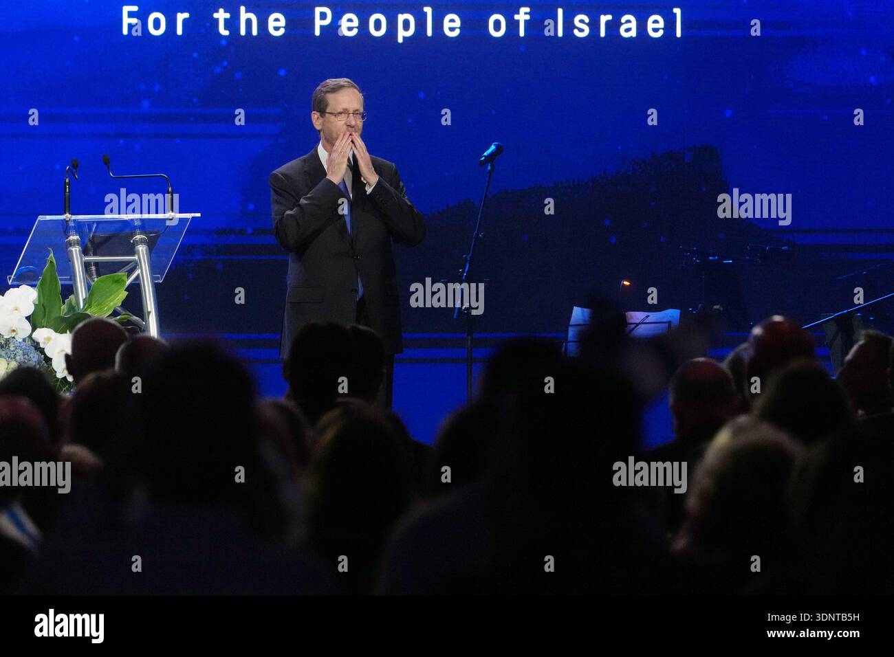 President of Israel Isaac Herzog thanks the crowd after speaking at a ...