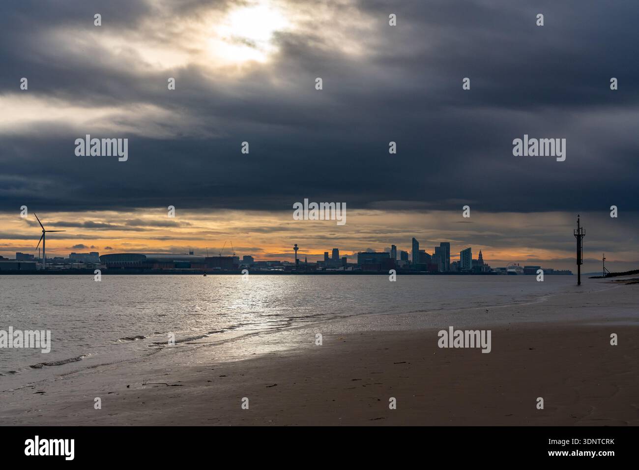 wide view of the Liverpool skyline seen from across the Mersey Estuary ...