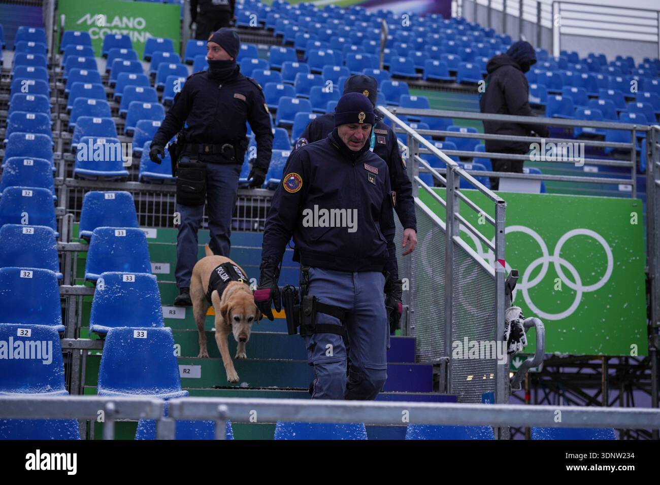 Italian Carabinieri paramilitary police patrol the stands with a dog ...
