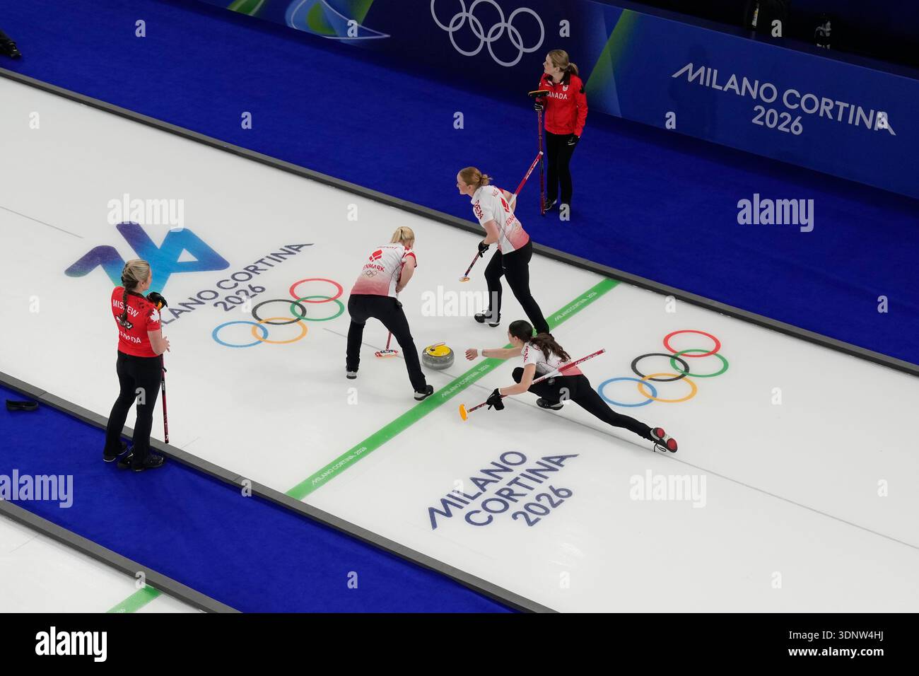 Team Denmark competes against Canada during a women's curling round ...