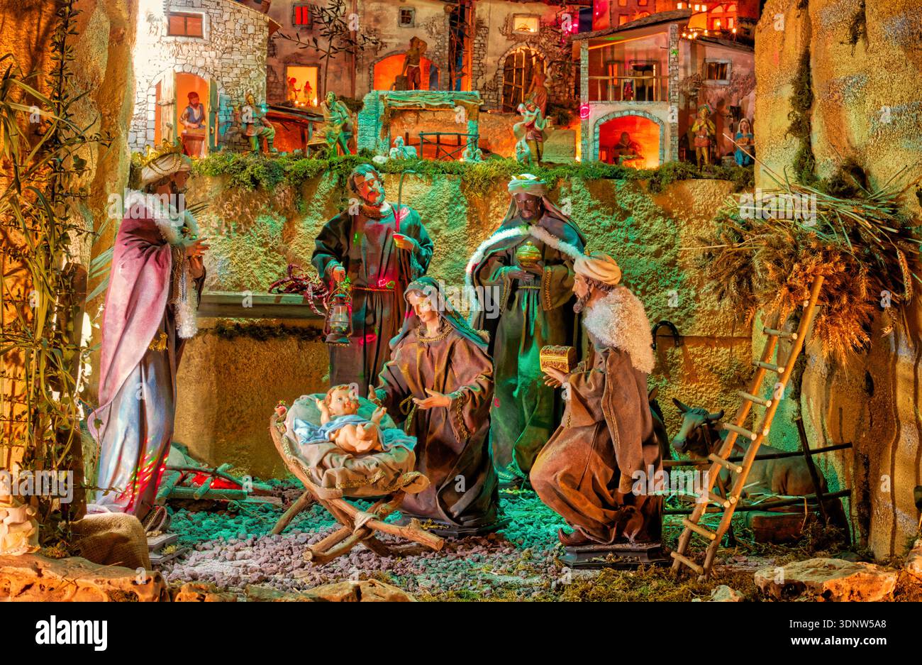 Christmas Nativity scene of baby Jesus in the manger with Saint Joseph ...