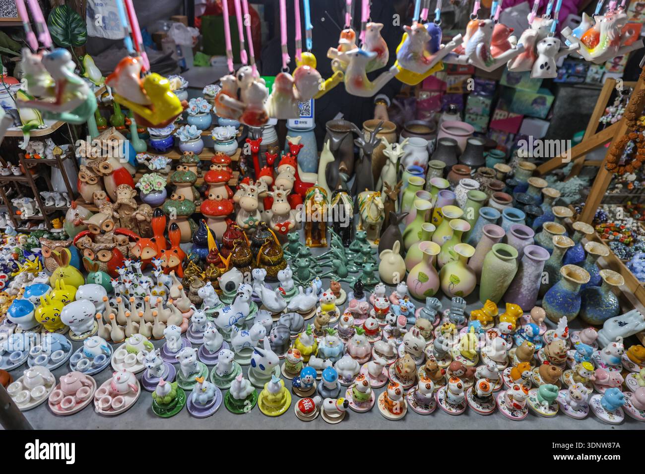 Tourists visit creative ceramic shops at Jingdezhen Sculpture Porcelain ...
