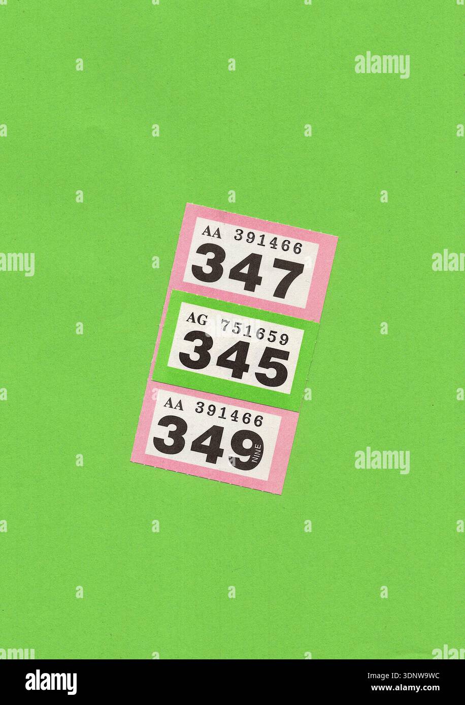 Vintage raffle tickets with one in a different colour isolated on a ...