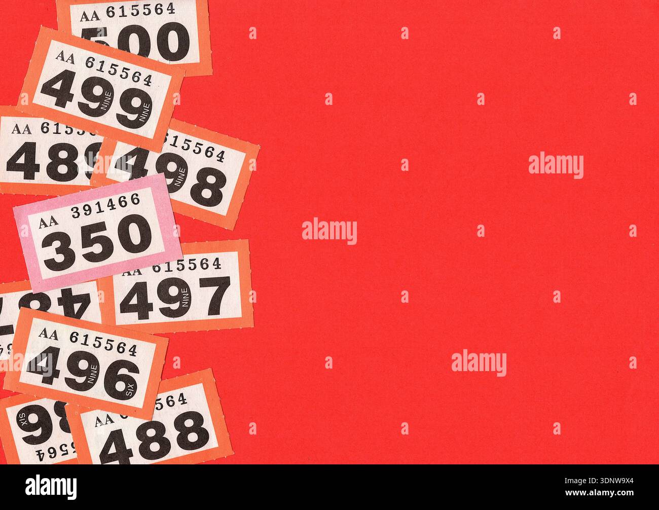 Vintage raffle tickets with one in a different colour isolated on a ...