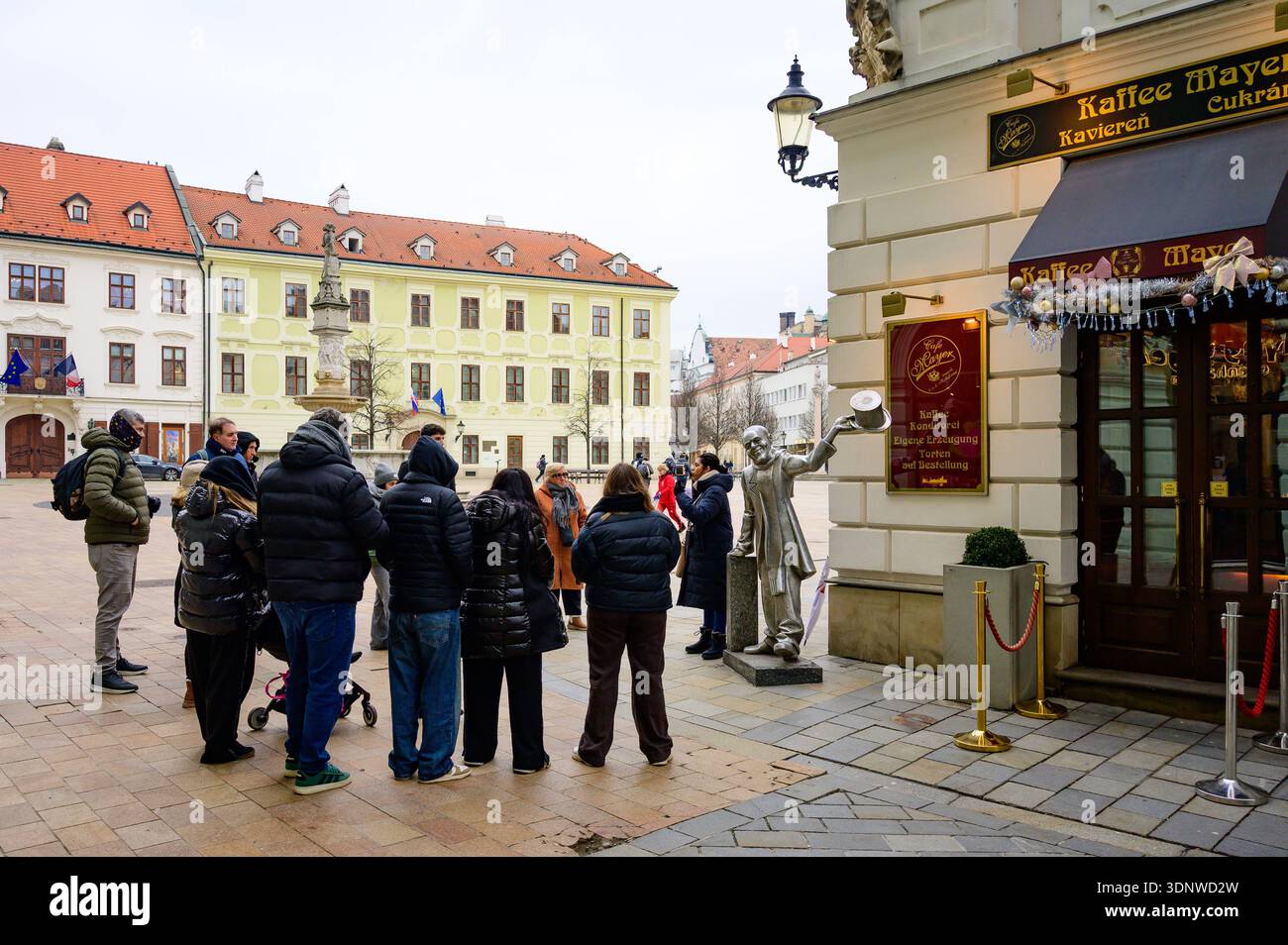 bratislava, slovakia, 10 feb 2026, tourist group in front of monument ...