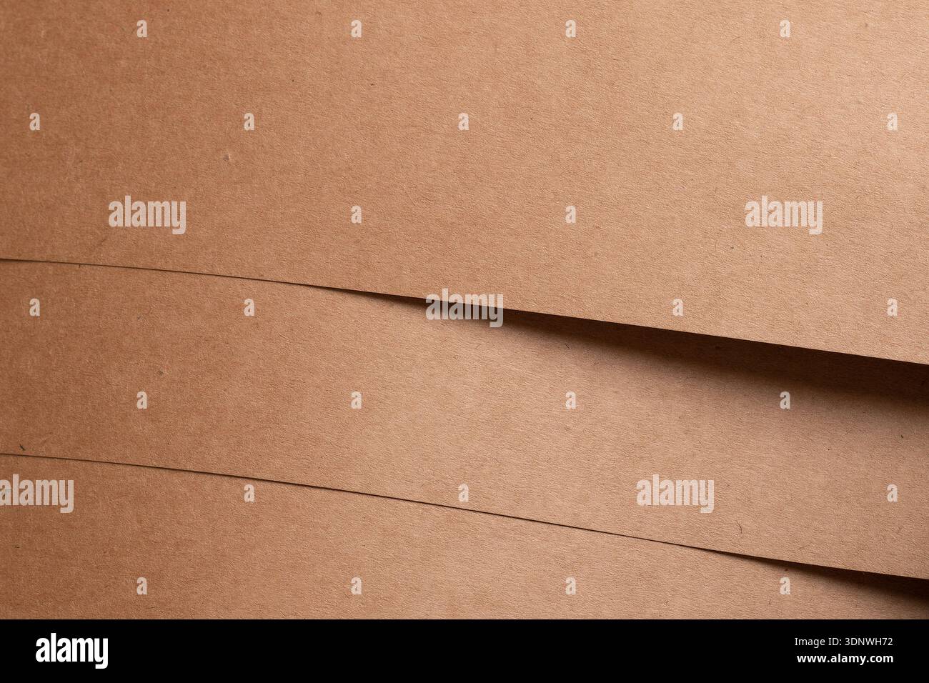 Brown kraft paper textured background with stitched seam detail and ...
