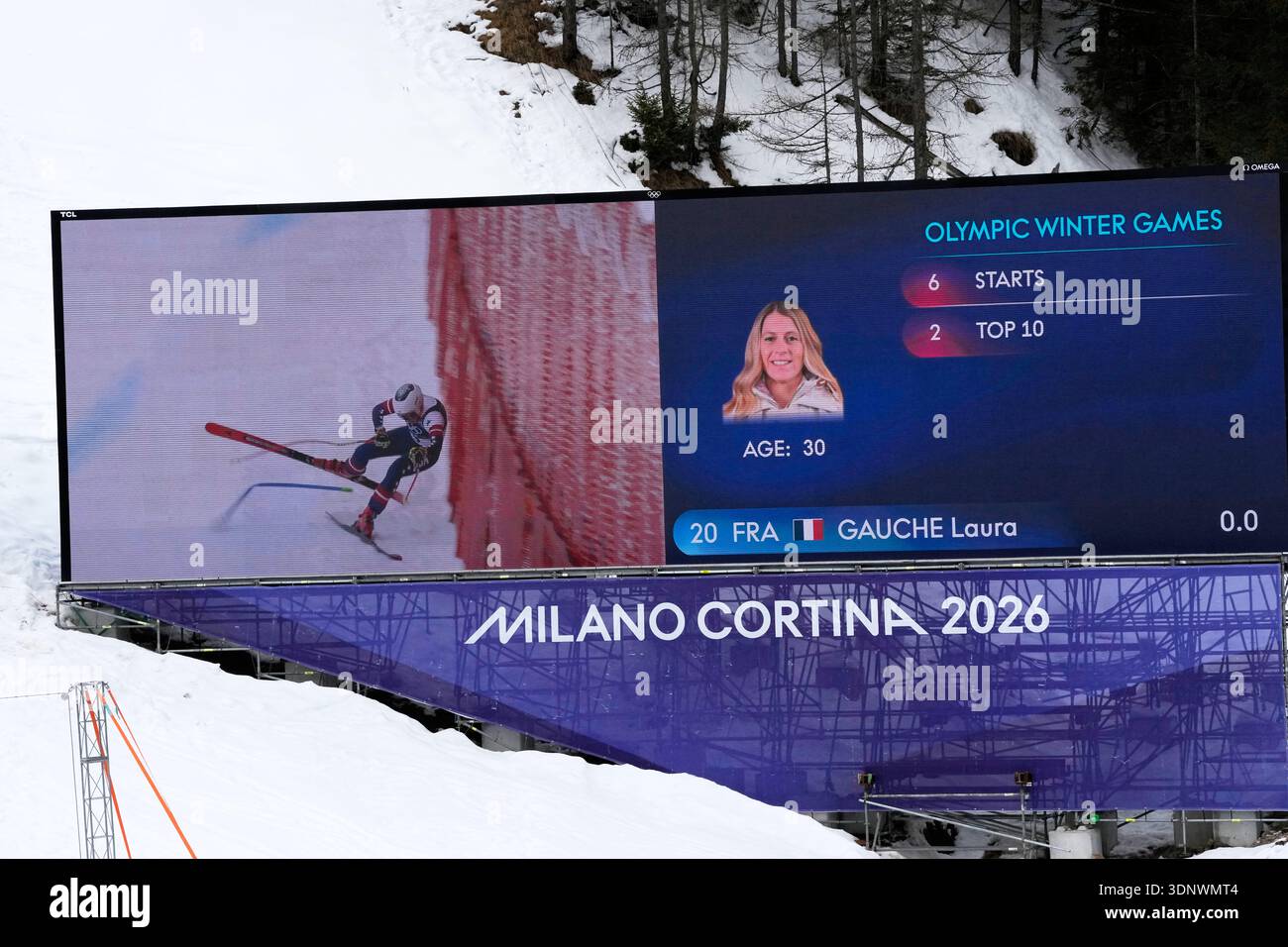United States' Breezy Johnson is seen on a giant screen as she skied ...