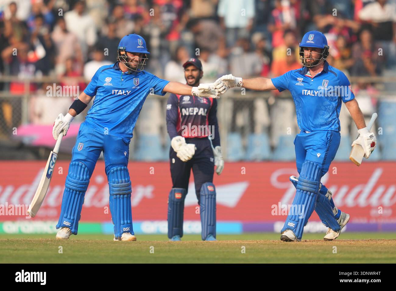 Italy's Justin Mosca, left, Anthony Mosca, right, encourage each other ...