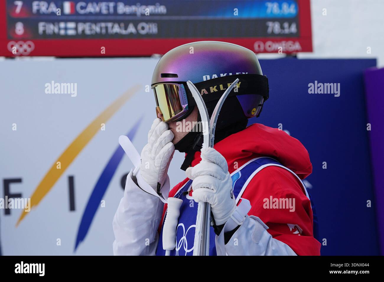 France's Benjamin Cavet reacts to his score during the men's freestyle ...