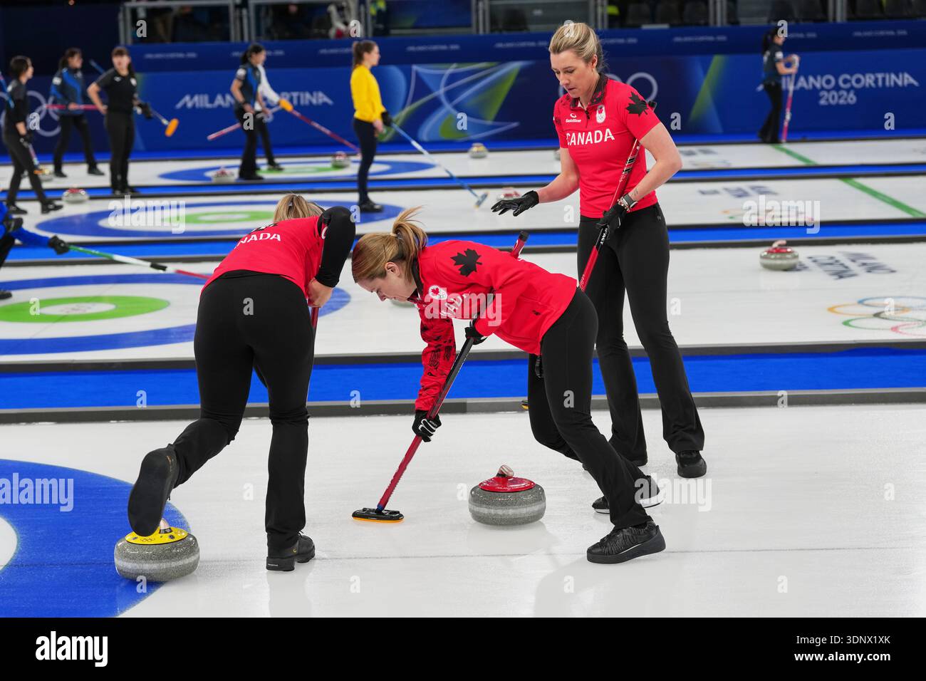 Canada's Tracy Fleury, center, Emma Miskew, right, and Rachel Homan in ...