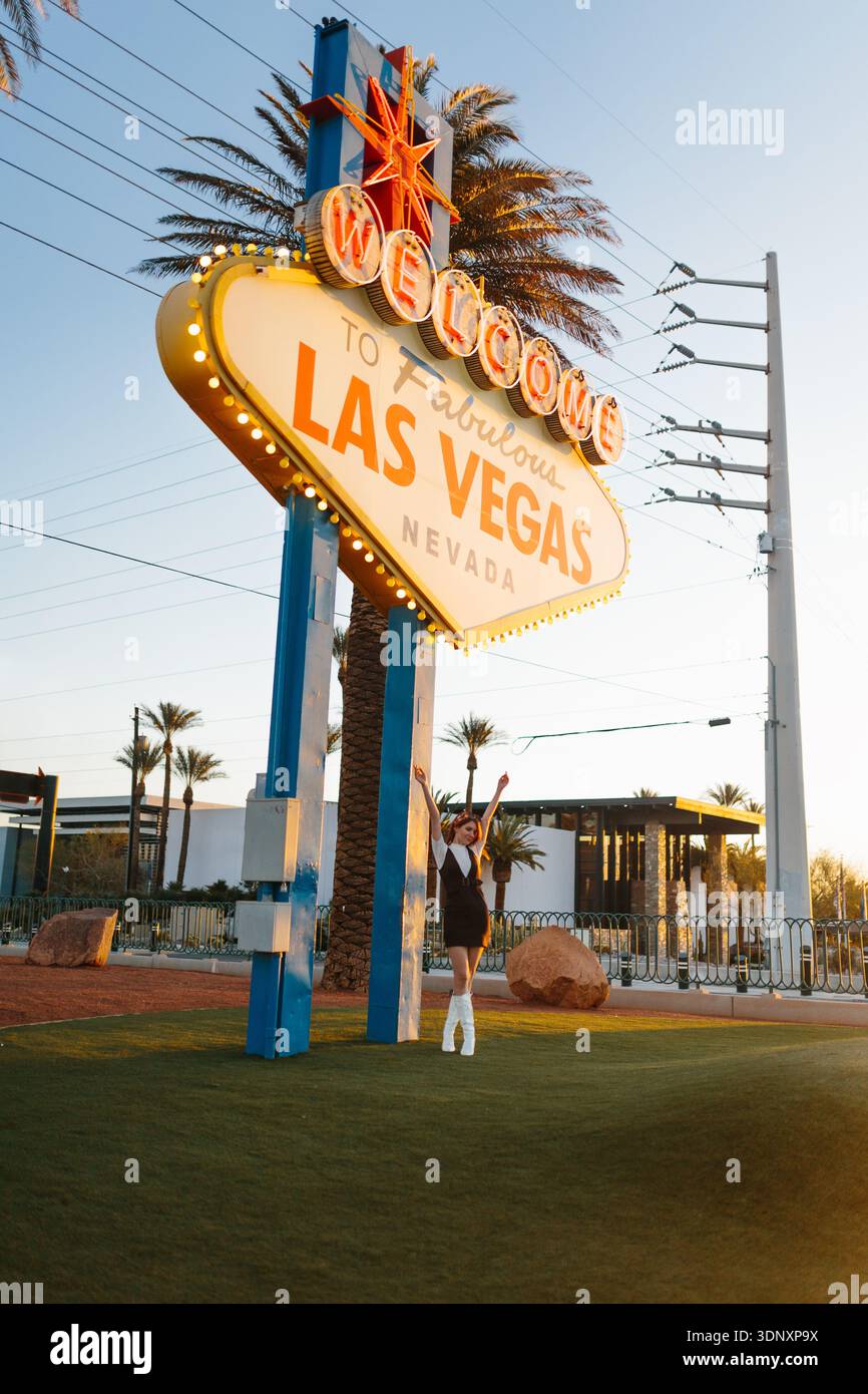 The iconic Welcome to Fabulous Las Vegas sign glows warmly at sunset ...