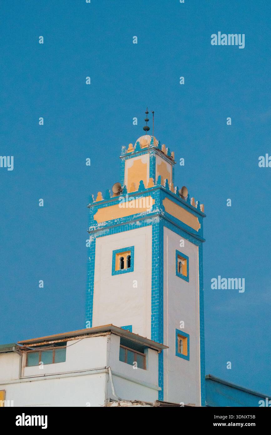A beautifully detailed mosque tower in Taghazout, Morocco, showcases ...