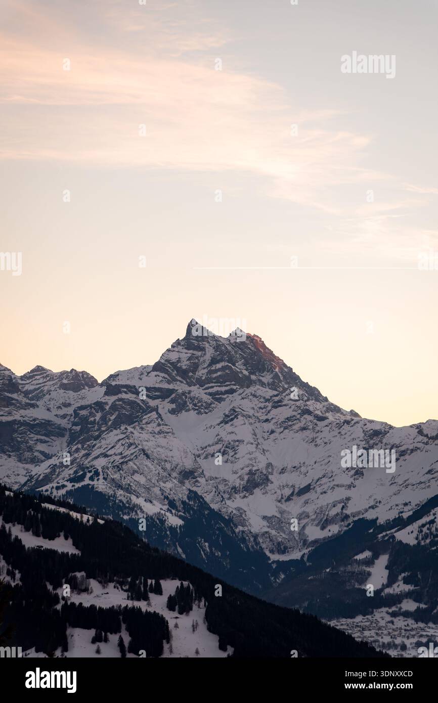 A stunning winter landscape in Switzerland showcases majestic snow ...