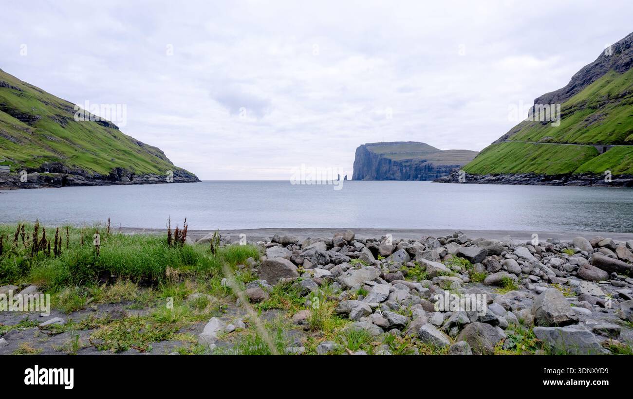 Scenic view of Risin og Kellingin sea stacks from Tjornuvik, located on ...