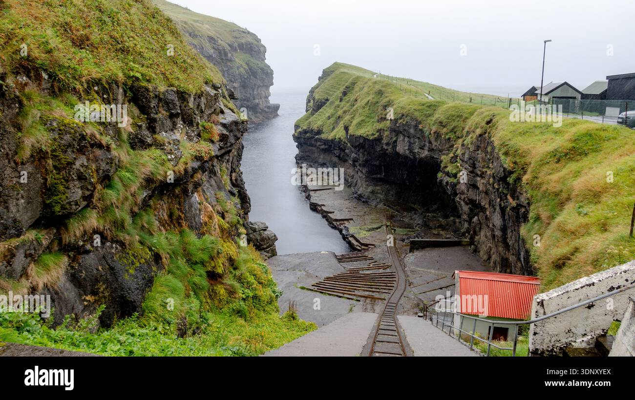 The enchanting village of Gjogv on Eysturoy Island features a natural ...