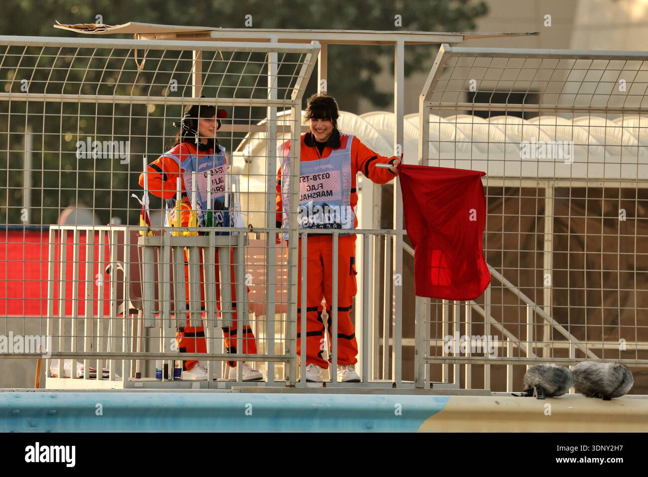Sakhir, Bahrain. 12th Feb, 2026. Circuit atmosphere - marshal holds out ...