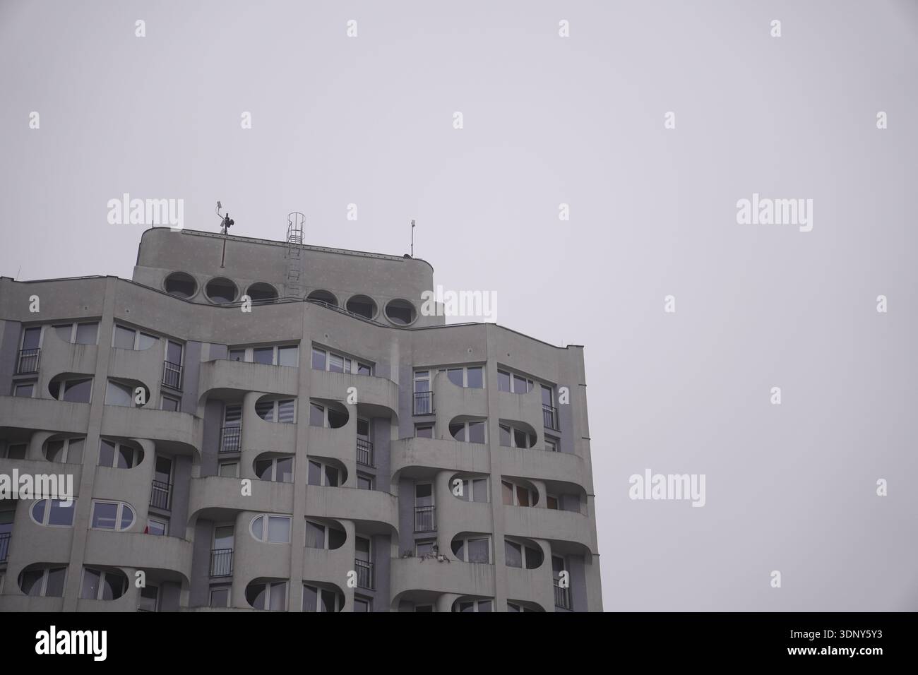 Soviet-era brutalist concrete residential building with distinctive ...