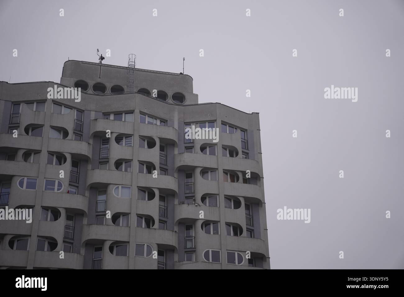 Impressive brutalist concrete residential tower with signature circular ...