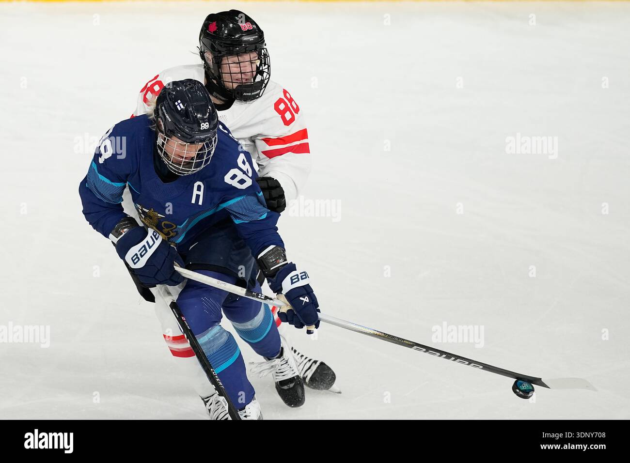 Canada's Julia Gosling, right, challenges Finland's Ronja Savolainen ...