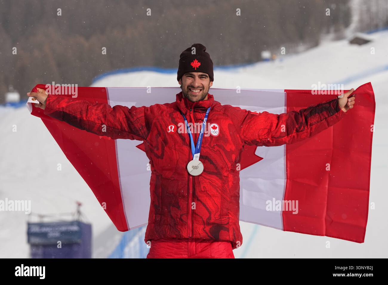 Silver medalist Canada's Eliot Grondin celebrates with a Canadian flag ...