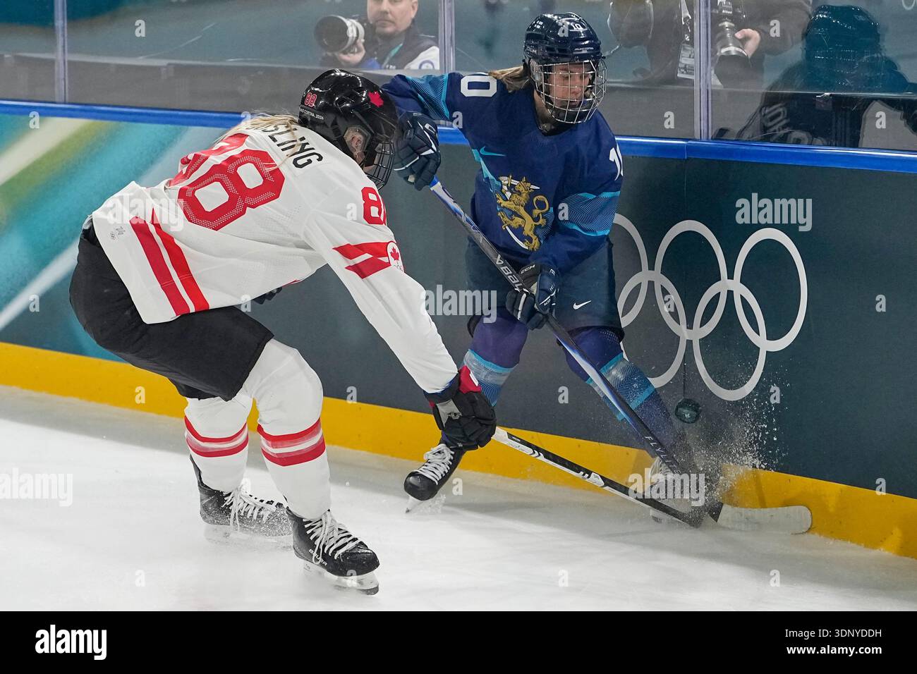 Finland's Elisa Holopainen, right, challenges Canada's Julia Gosling ...