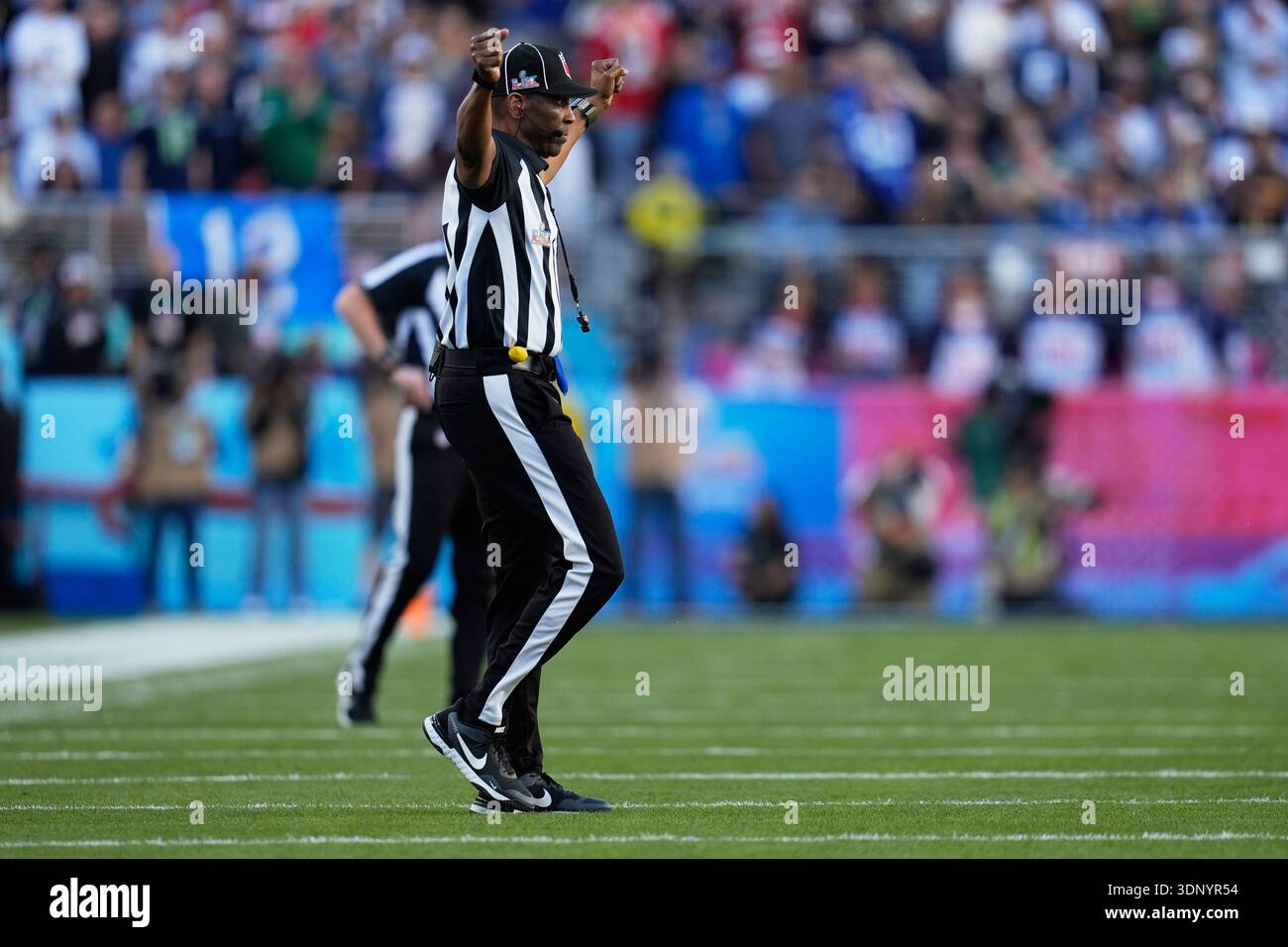 Line judge Julian Mapp works during the NFL Super Bowl 60 football game ...