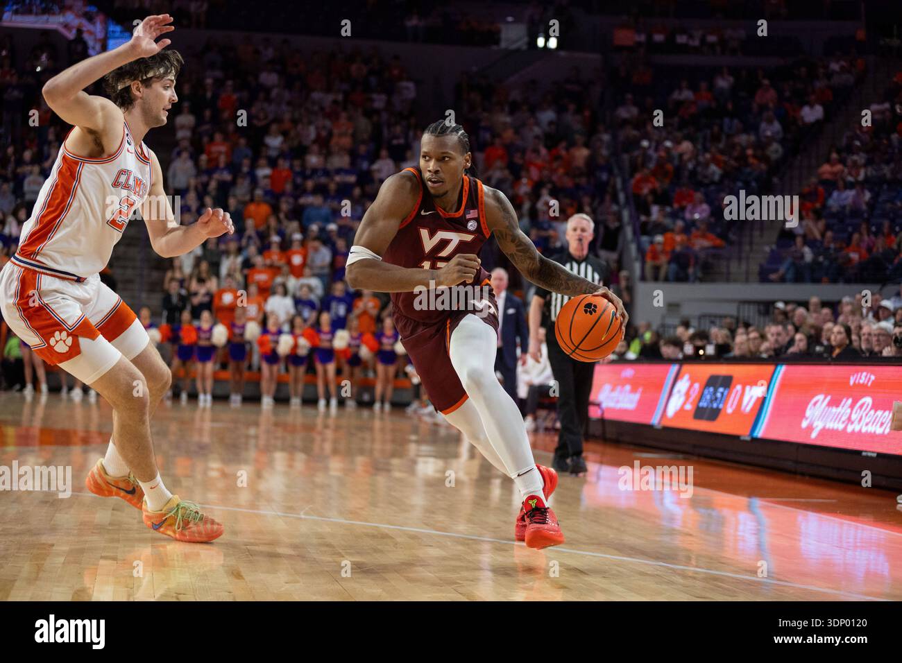 Virginia Tech forward Amani Hansberry (13) drives on Clemson center ...