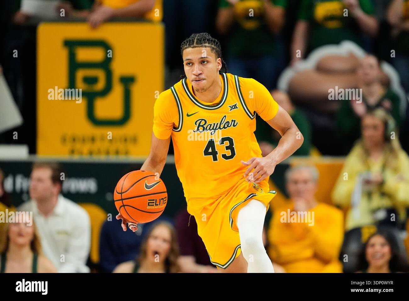 Baylor guard Cameron Carr drives upcourt during an NCAA college ...