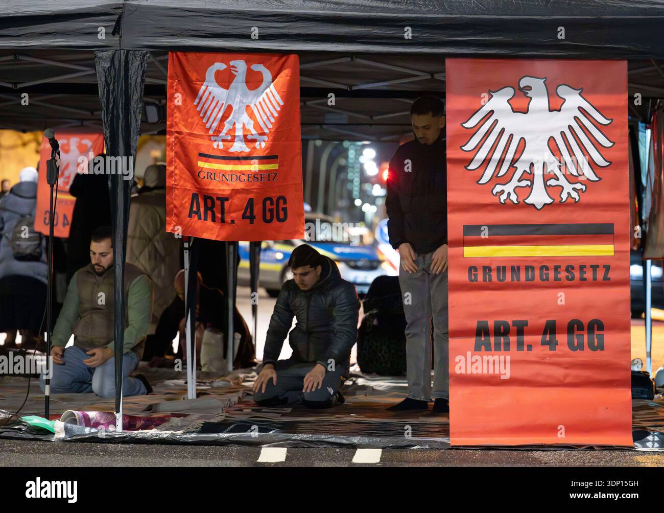 12 February 2026, Hesse, Frankfurt/Main: Men and women pray together ...