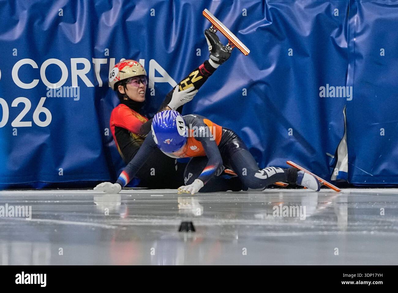 Michelle Velzeboer of the Netherlands and Kexin Fan of China crash ...