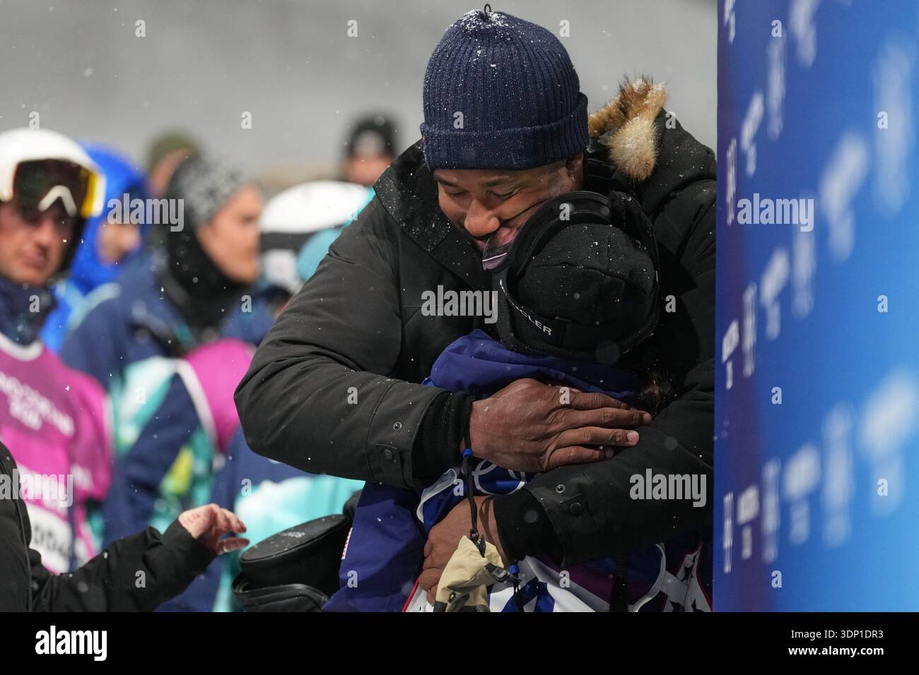 Cleveland Browns' Myles Garrett and United States' Chloe Kim kiss after ...