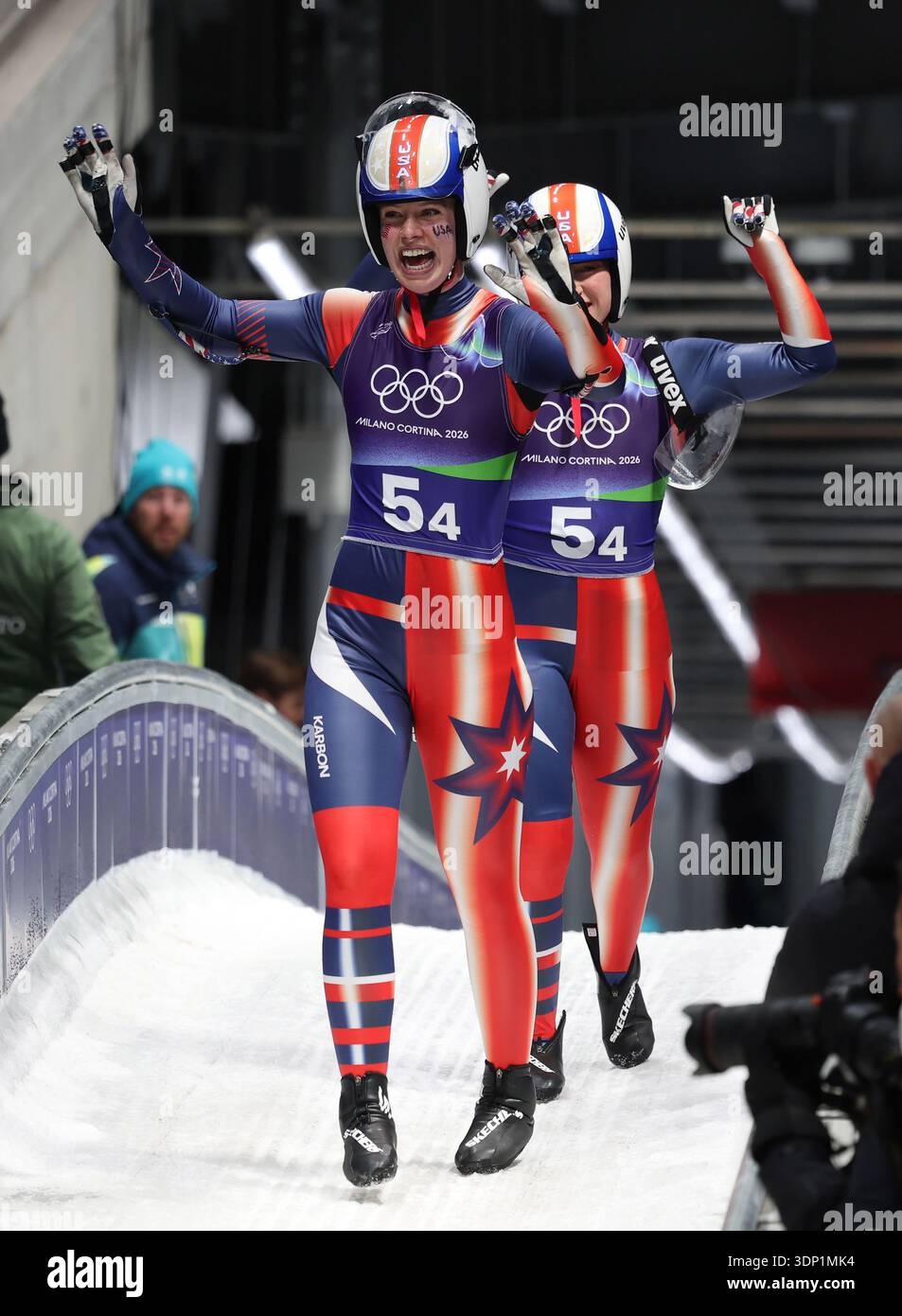 USA's Luger Emily Sweeney celebrates prematurely after their Luge relay ...