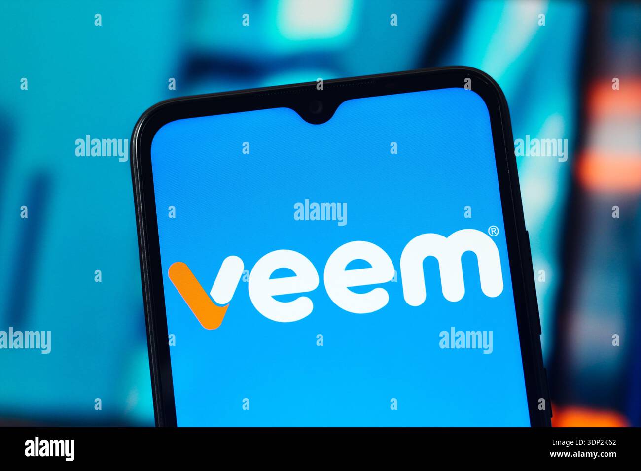 In this photo illustration, the Veem logo is seen displayed on a ...