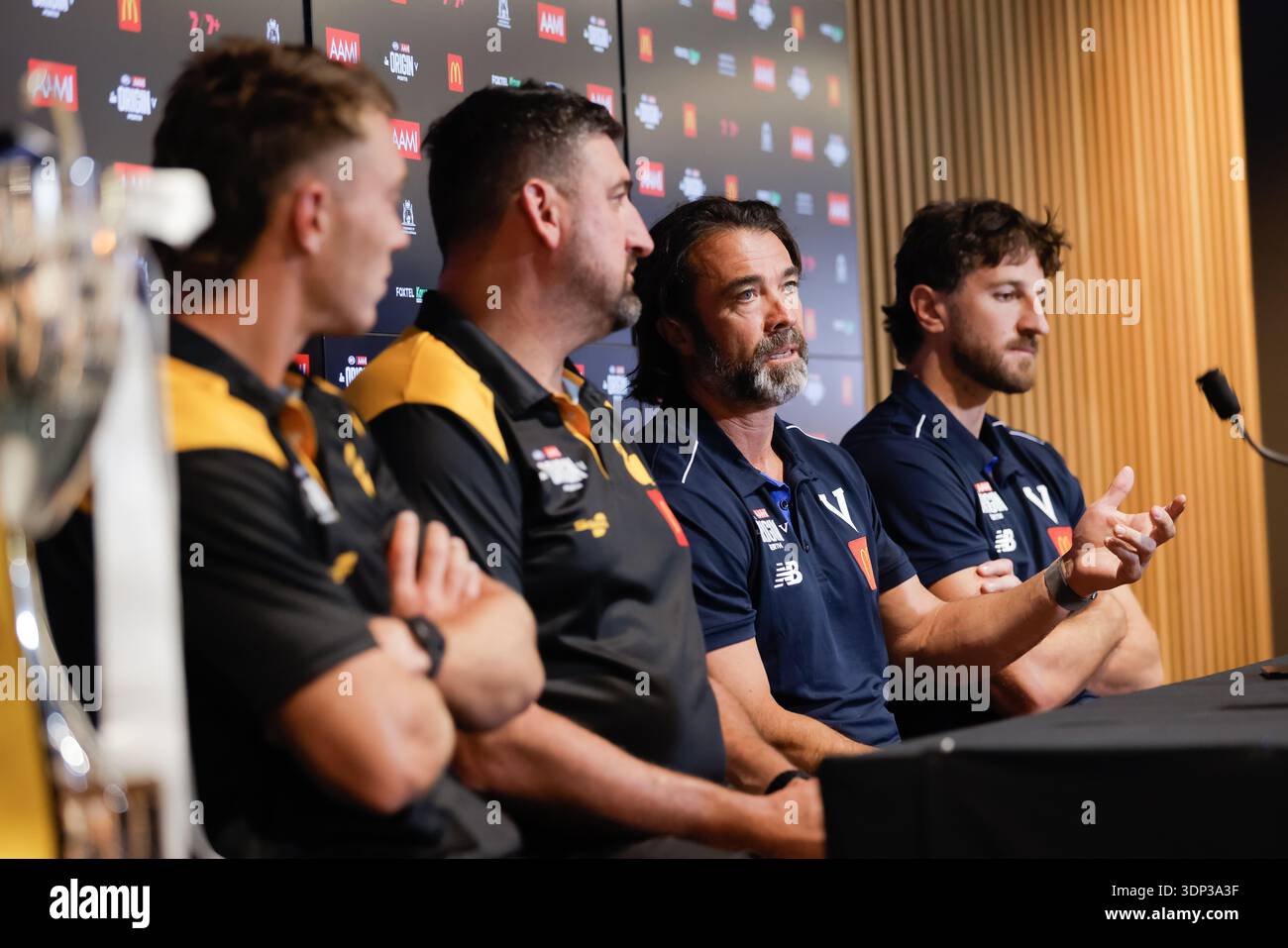 Victoria coach Chris Scott speaks as Western Australia captain Patrick ...