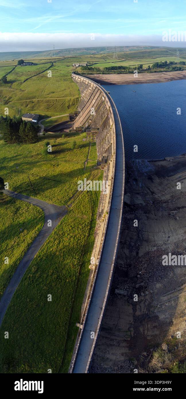 Aerial view of the massive curved concrete wall of Baitings Dam in West ...