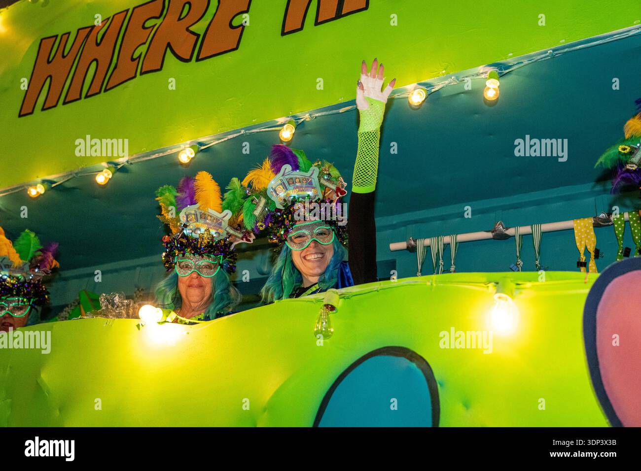 Attendees participate in the annual Krewe of Muses parade during the ...