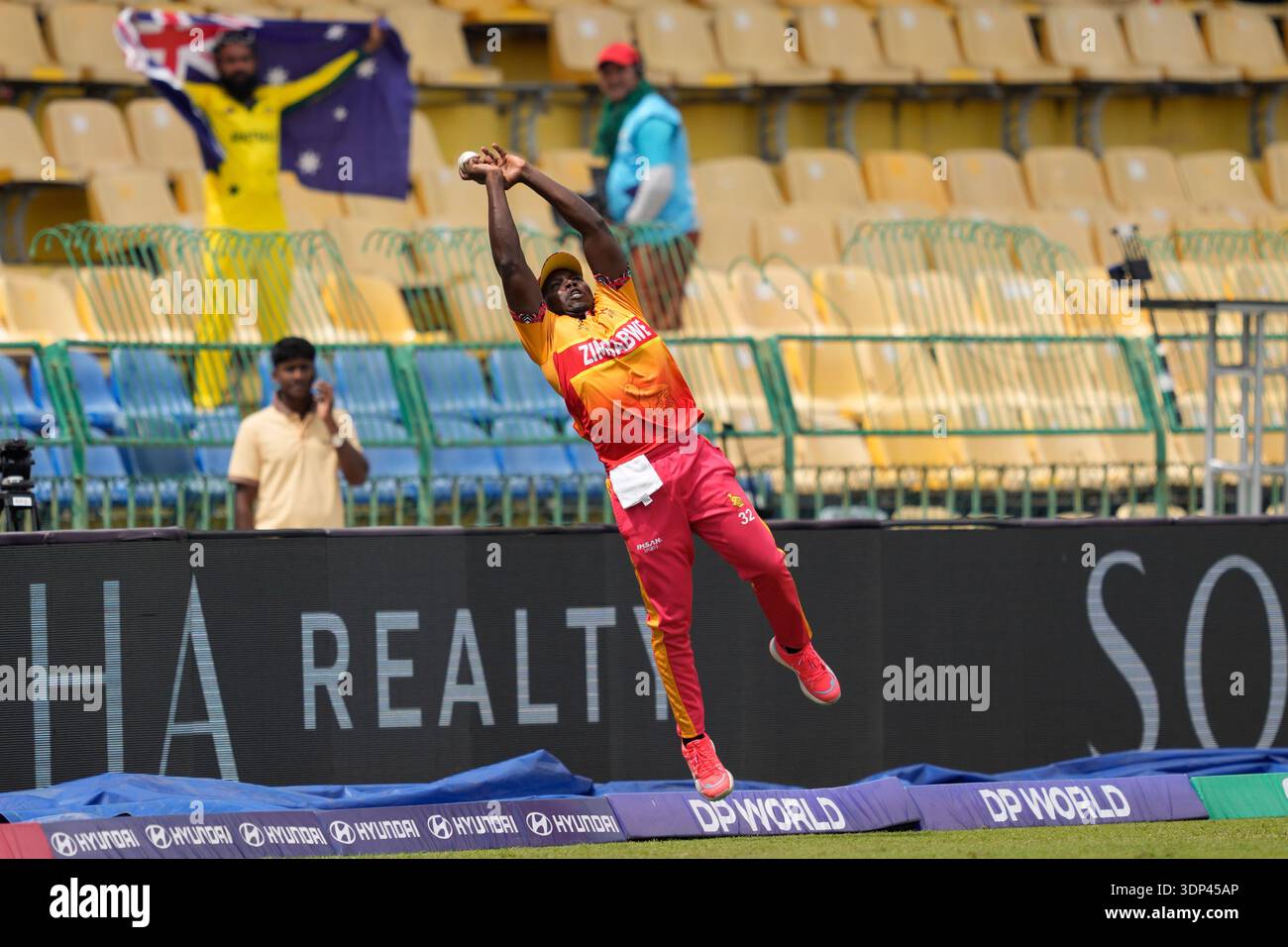 Zimbabwe's Tony Munyonga jumps to catch a ball during the T20 World Cup ...