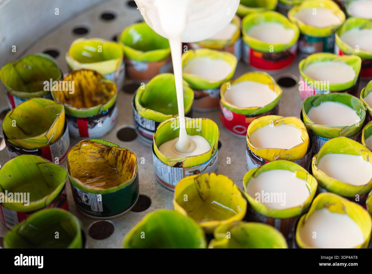 Traditional coconut custard poured hi-res stock photography and images ...